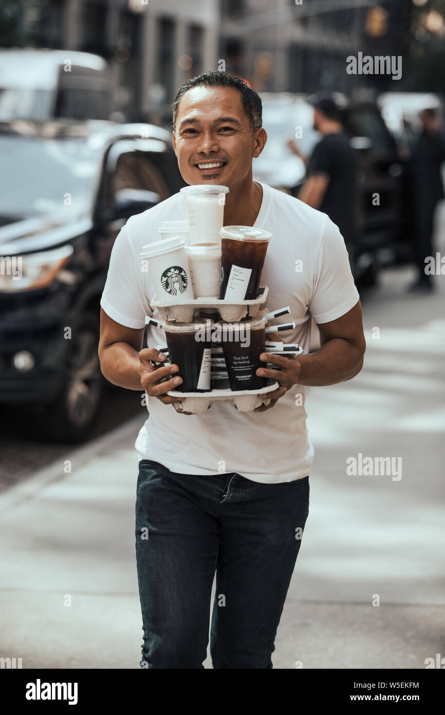 Amazing Starbucks coffee run in New York City Stock Photo - Alamy