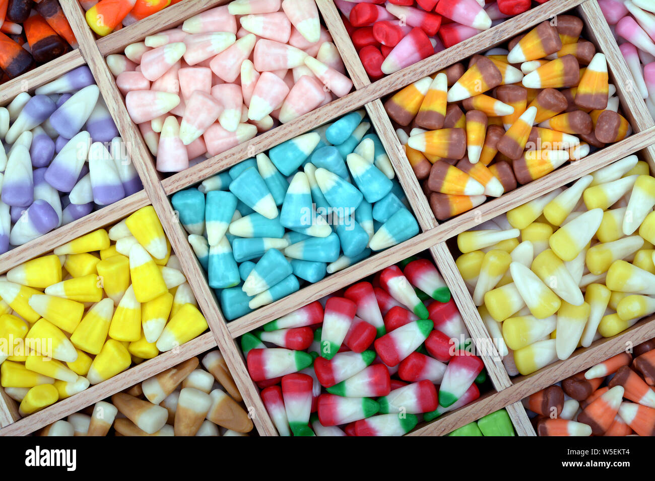 a lot of colorful assorted candy corn in the box Stock Photo - Alamy