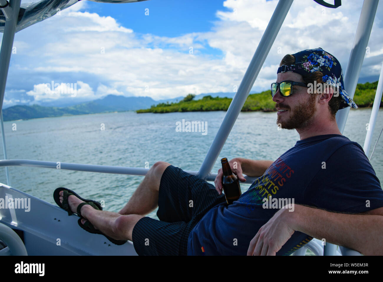 Beers on a Boat at Sunset Stock Photo - Alamy
