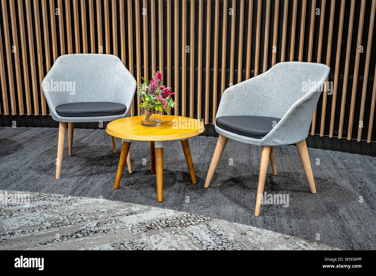 Elegant table and chairs arrangement Stock Photo - Alamy