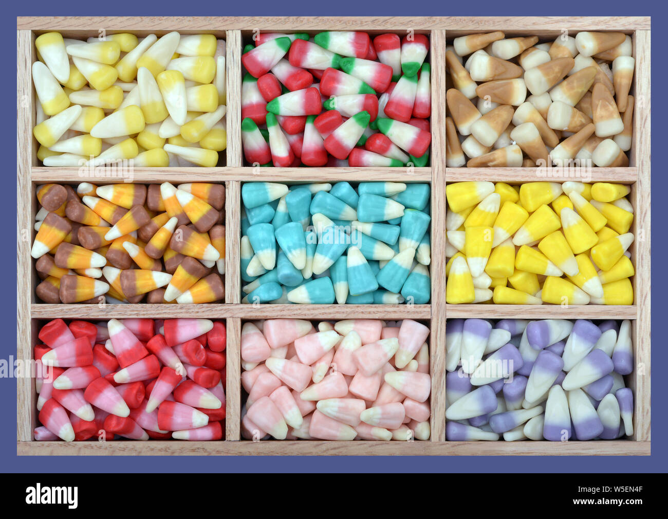 assorted colorful candy corn in wooden box Stock Photo - Alamy