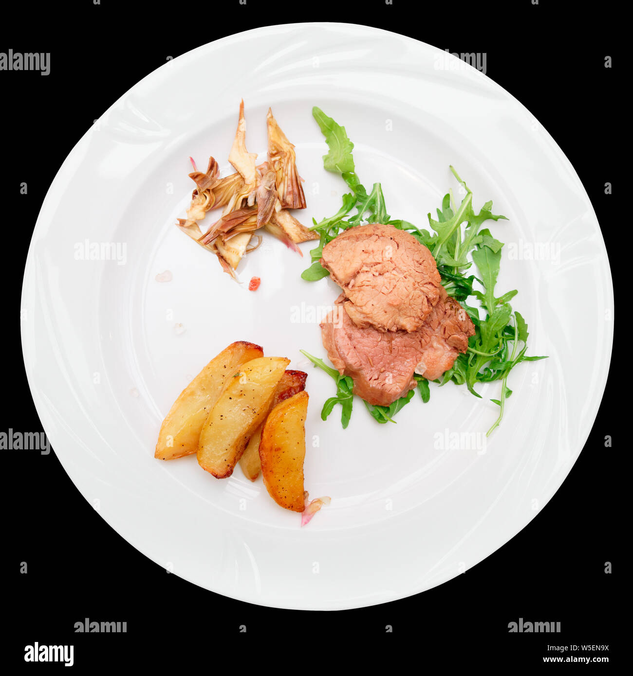 Delicious Italian Chianina beef dish isolated on black background Stock ...