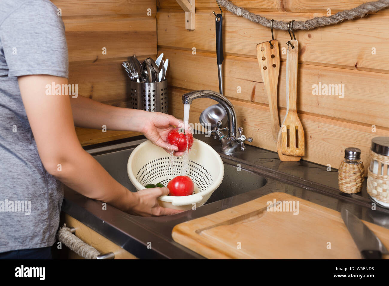 Washing tomato in running water hi-res stock photography and images - Alamy