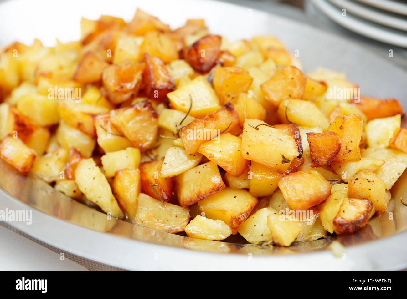 French farm frites potato wedges in stainless steel bowl Stock Photo ...