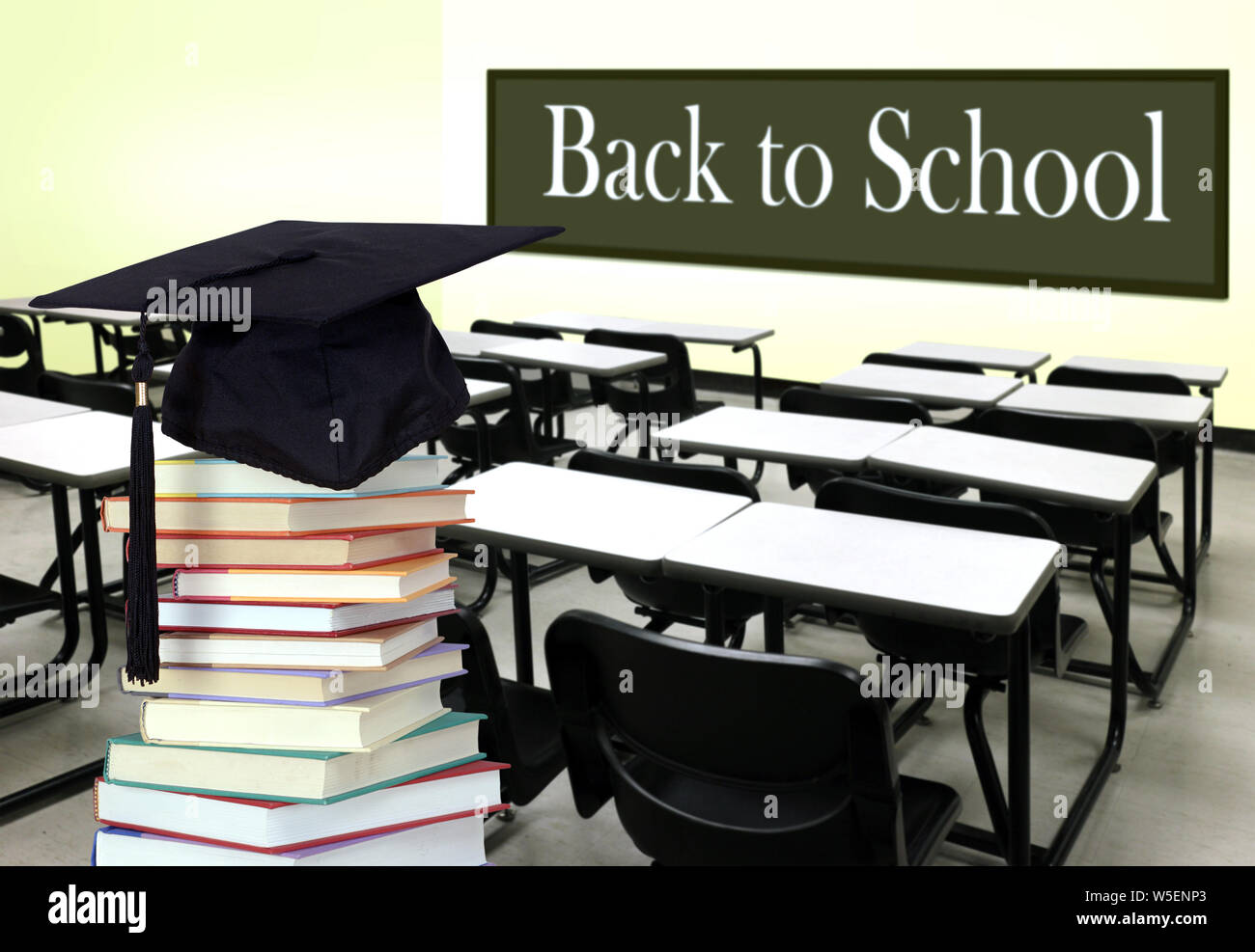 Education concept with book and empty classroom Stock Photo - Alamy