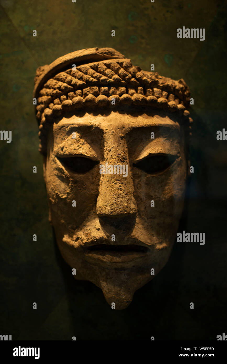 Stucco head of Comalcalco (cabeza de Comalcalco). Portrait of an ...