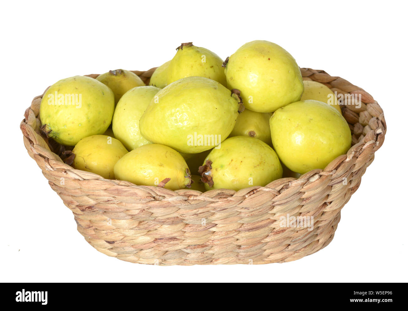 lot of guava in basket isolated on white Stock Photo - Alamy