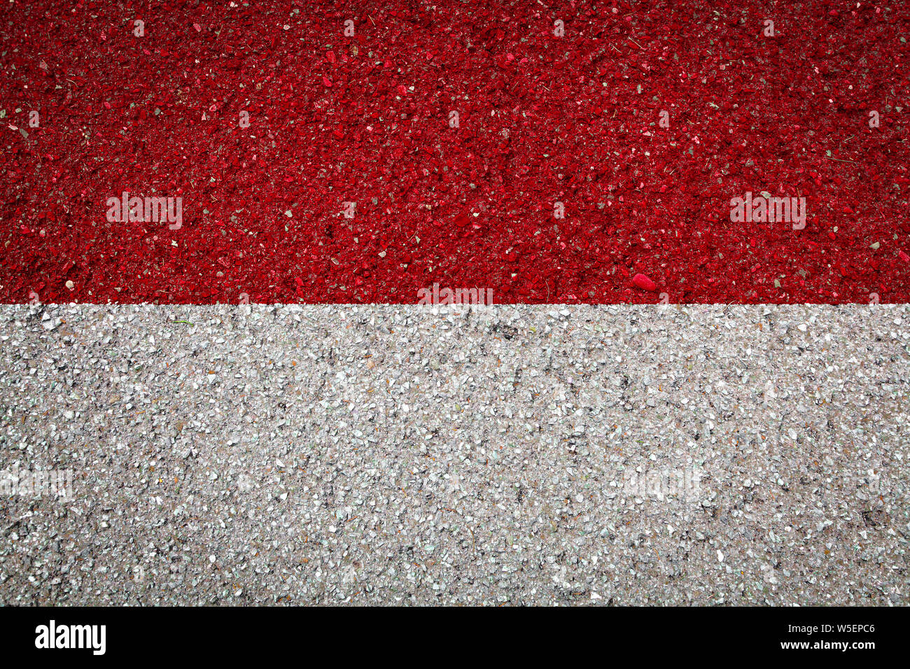 National flag of Indonesia on a stone background.The concept of ...