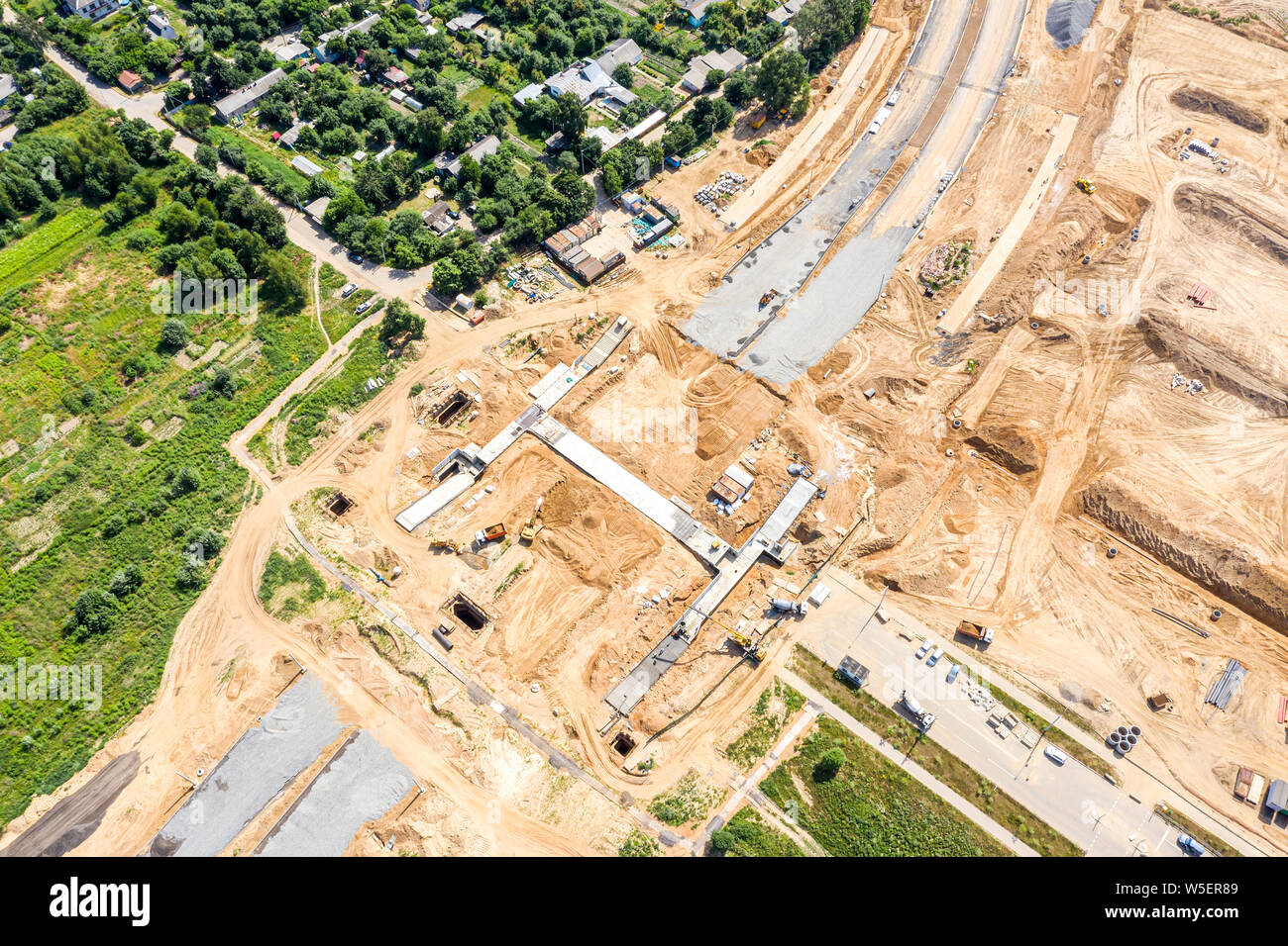 aerial top view of construction site. building of new road at suburb ...
