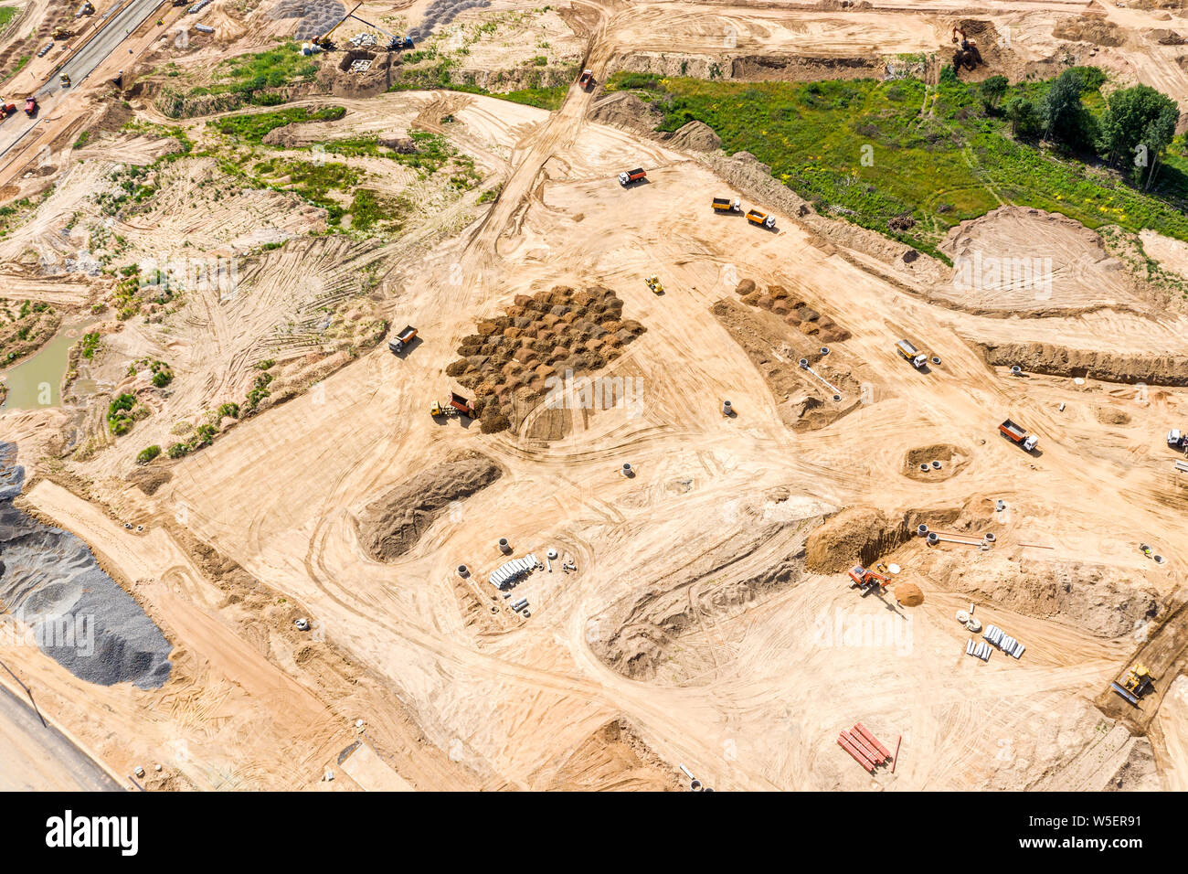 aerial top view of construction site with building machinery ...