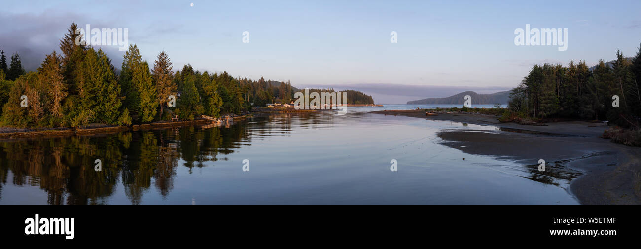 Beautiful Panoramic View of a river joining the ocean in a small town ...