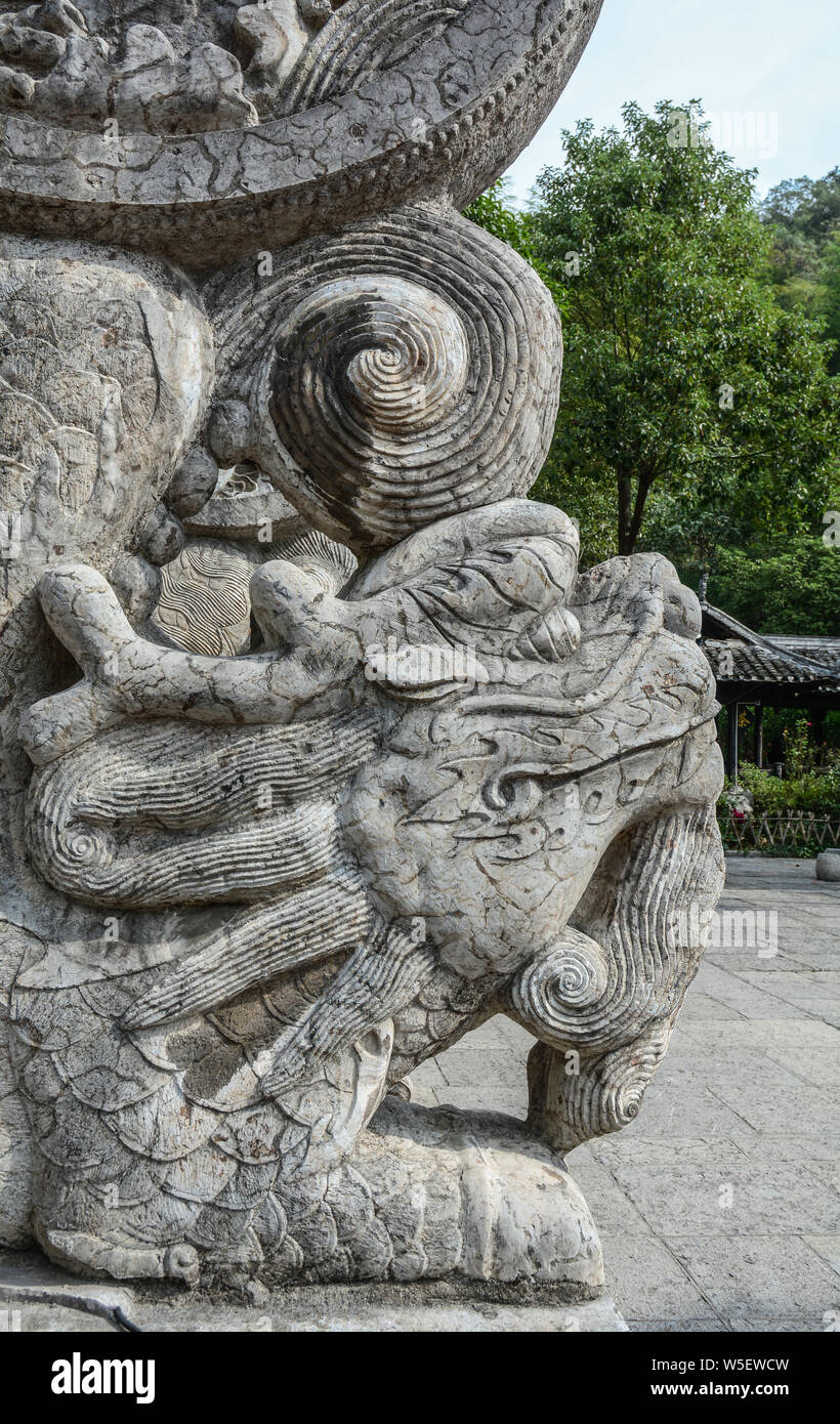 Stone dragon head scultpure close-up in a Buddhist temple Stock Photo ...