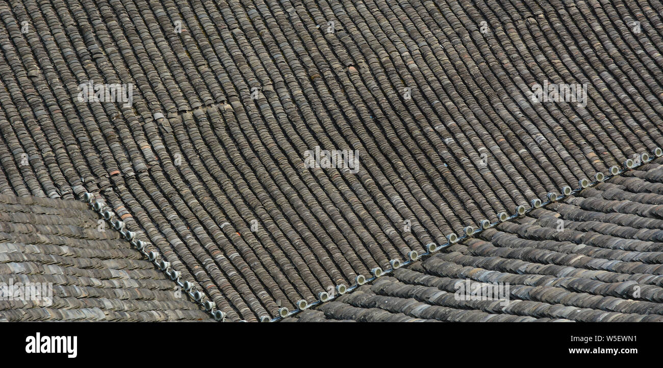 A traditional style brick tile roof in Lijiang, China Stock Photo - Alamy