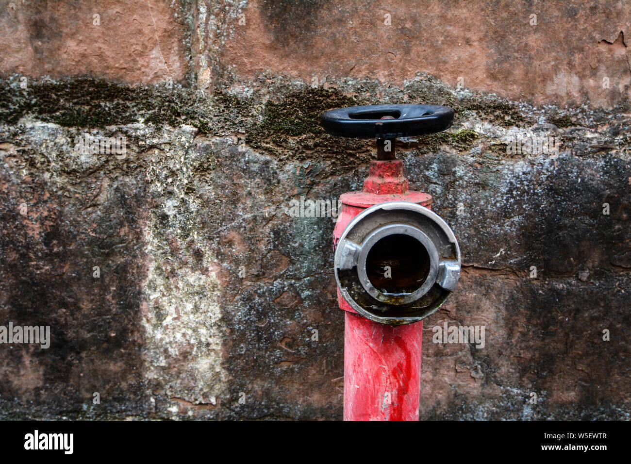 Fire hydrant on street at old town in Hunan, China Stock Photo - Alamy