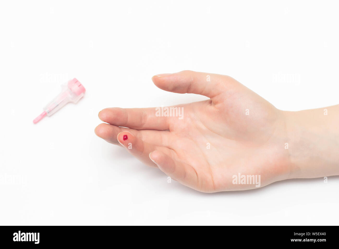Painless taking blood from a finger using a disposable scarifier on a ...