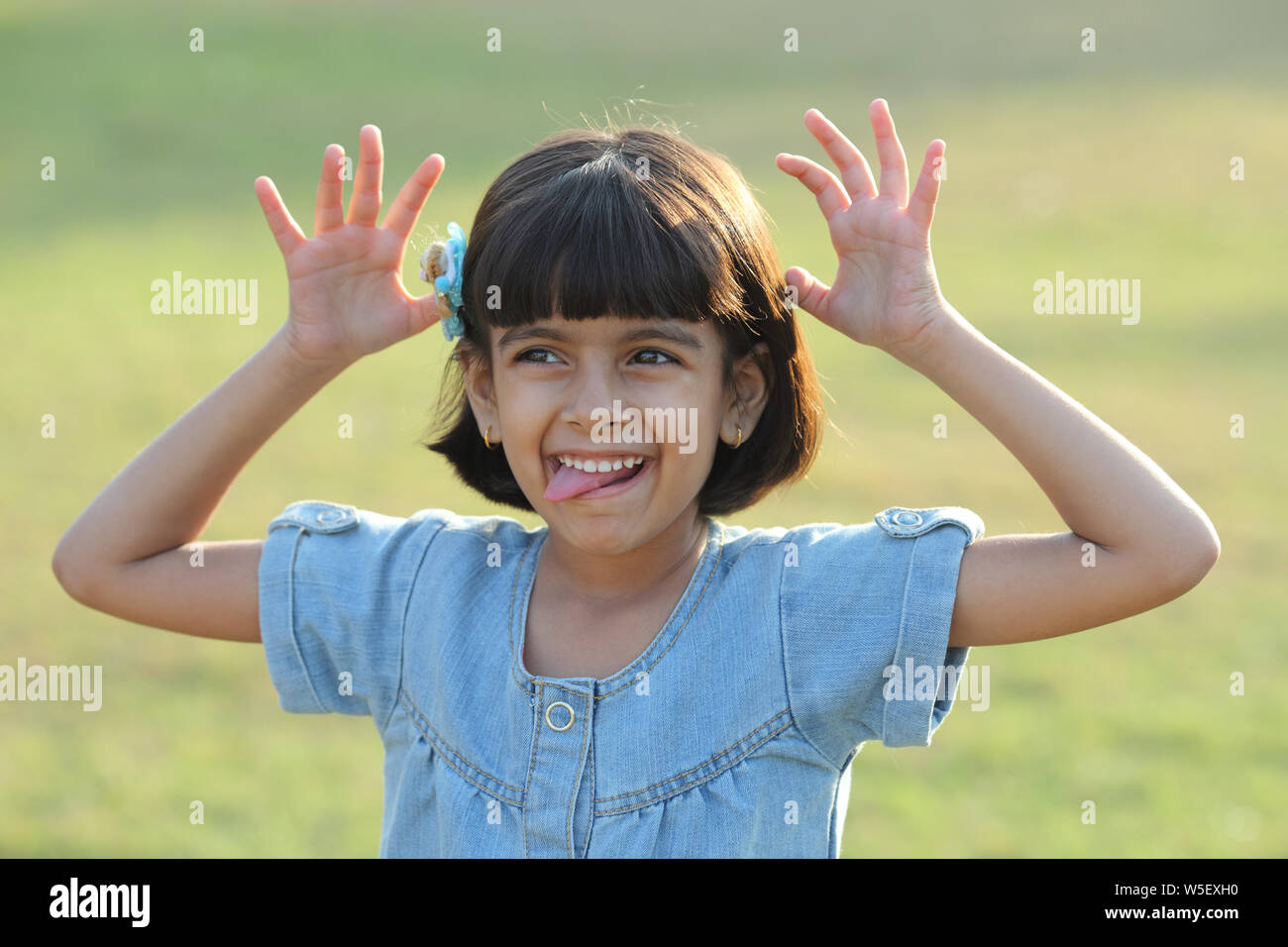 Girl making a funny face Stock Photo - Alamy