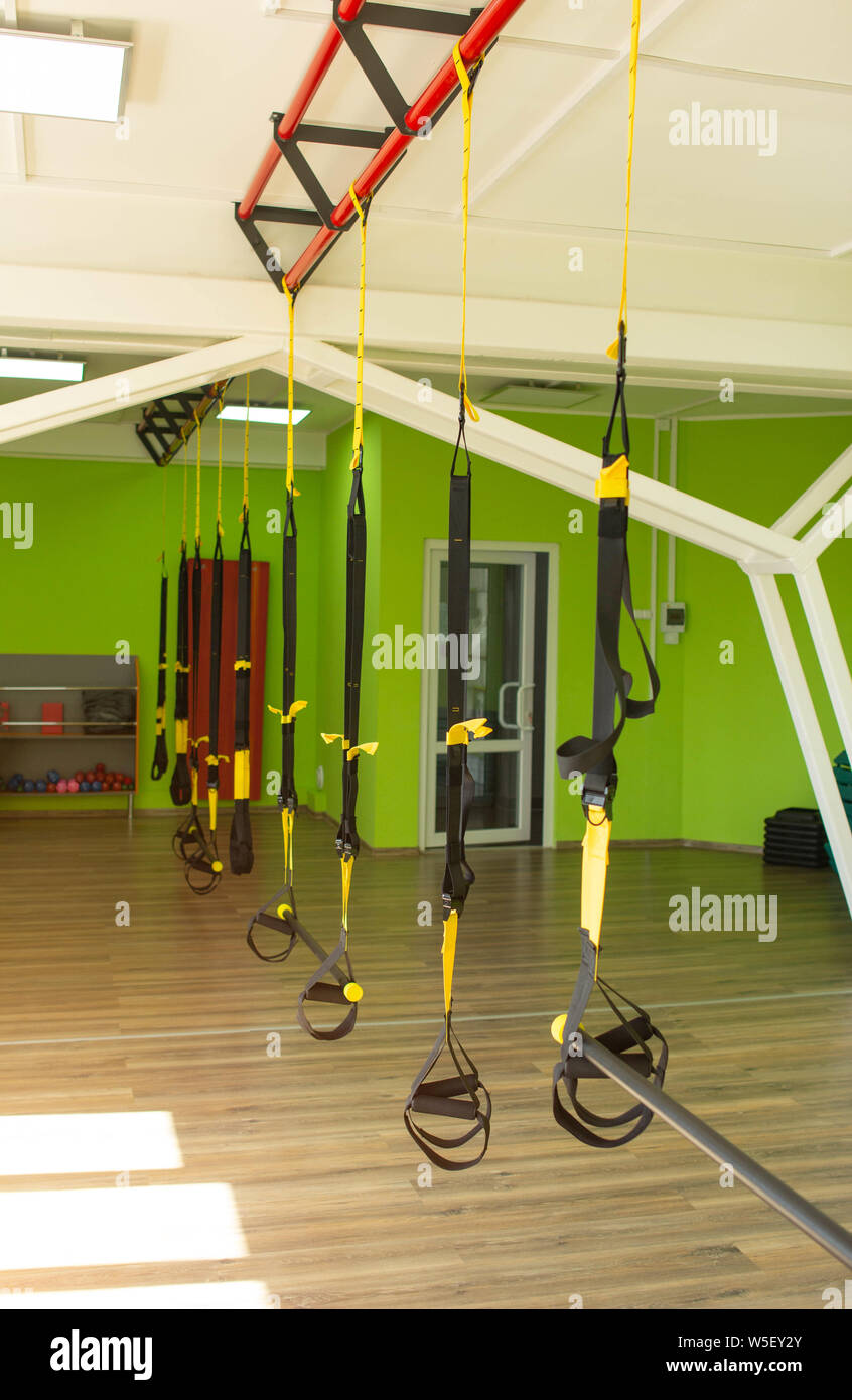 The modern form of fitness and sport loop in the new gym, muscles ...