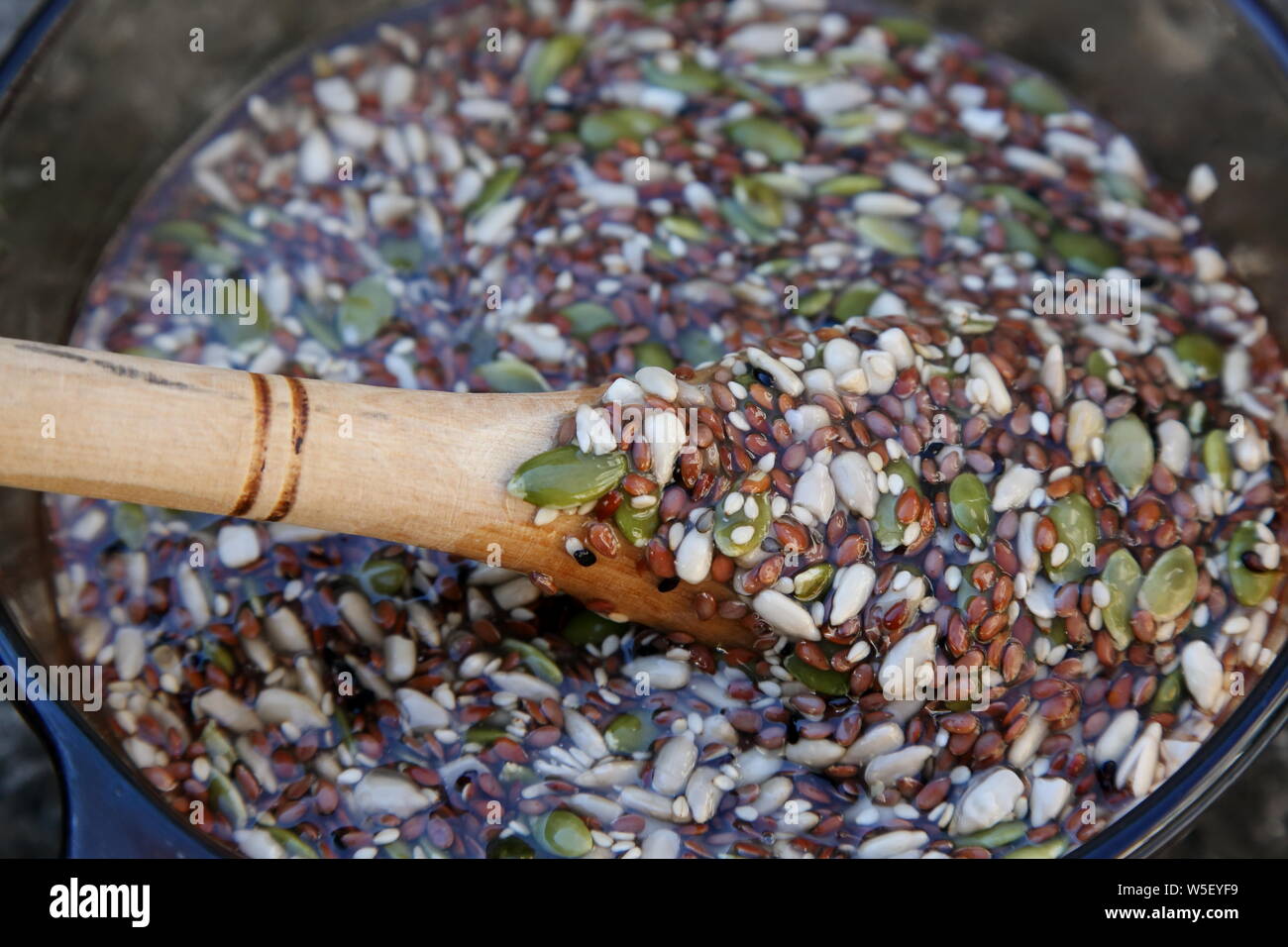 detail of the preparation of mucilage by soaking raw seeds Stock Photo ...