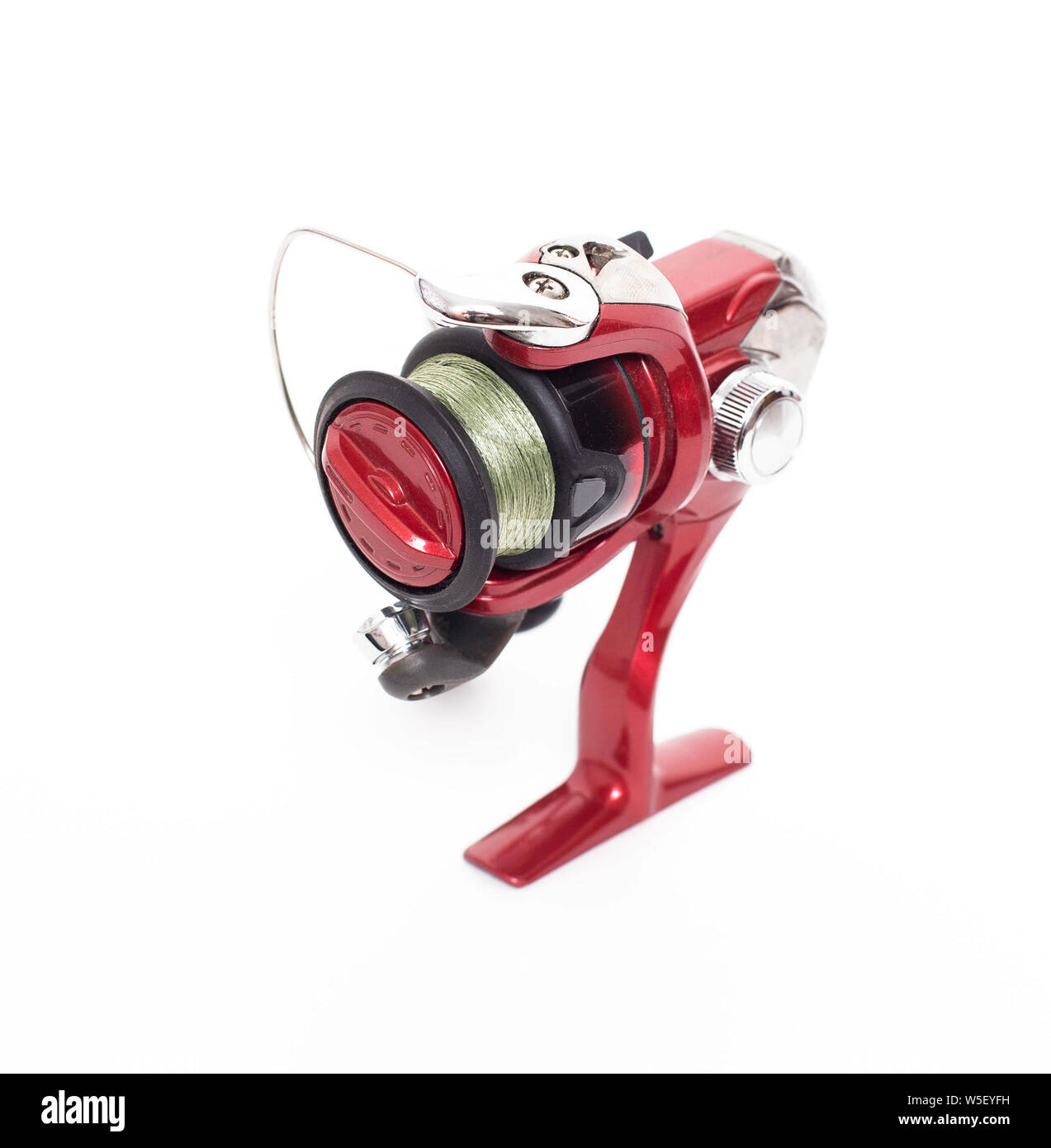 Red fish reel for fishing and spinning for fishing, isolate, friction ...
