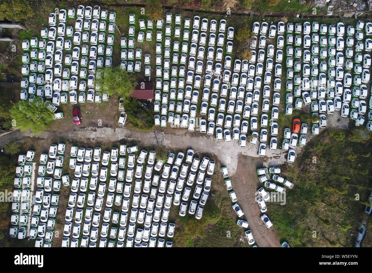 Broken and abandoned electric vehicle (EV) of a Chinese car-sharing ...