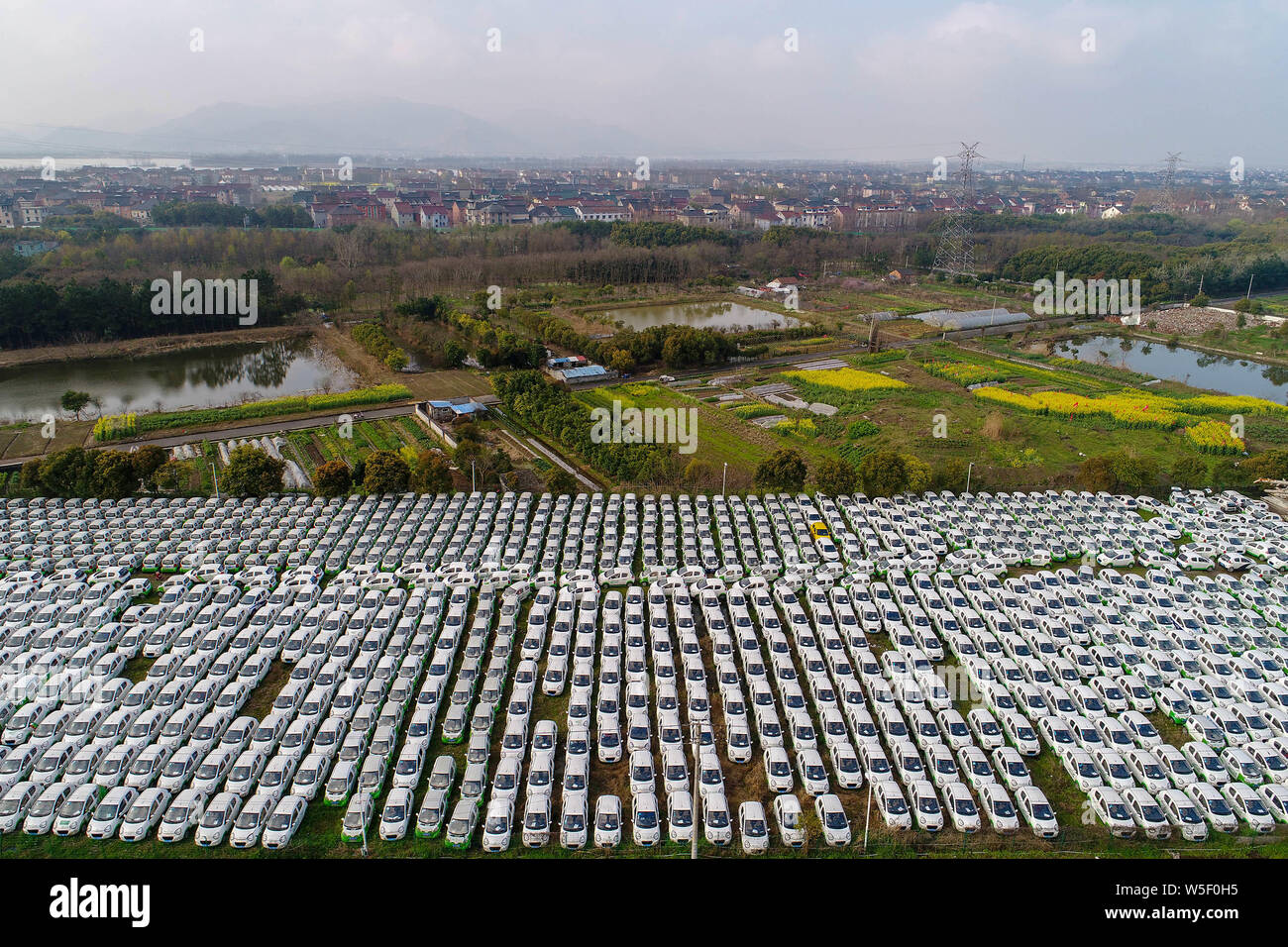 Broken and abandoned electric vehicle (EV) of a Chinese car-sharing ...