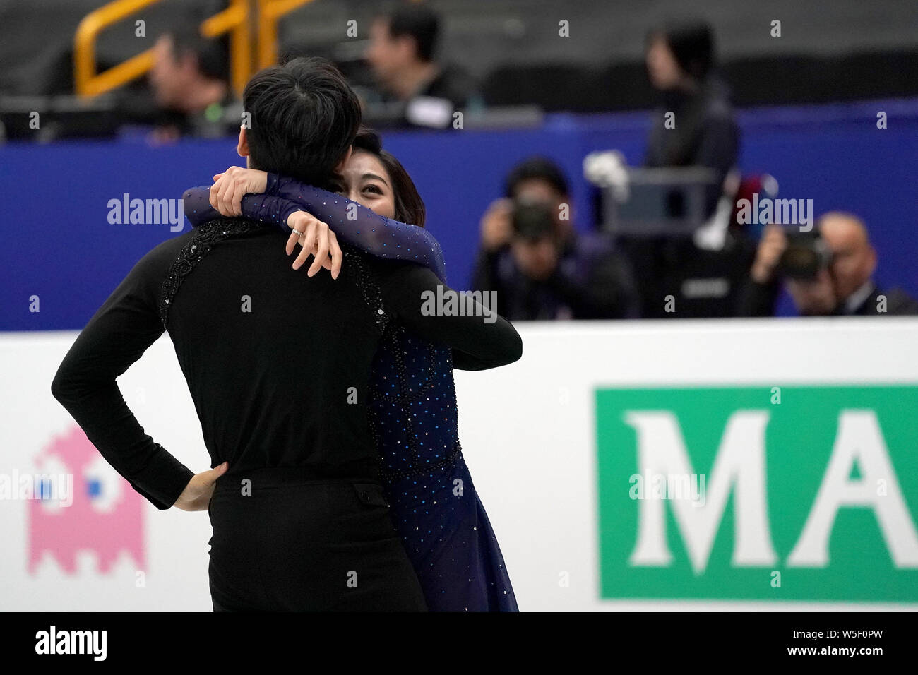 Chinese figure skaters Sui Wenjing and Han Cong compete in the Pairs ...