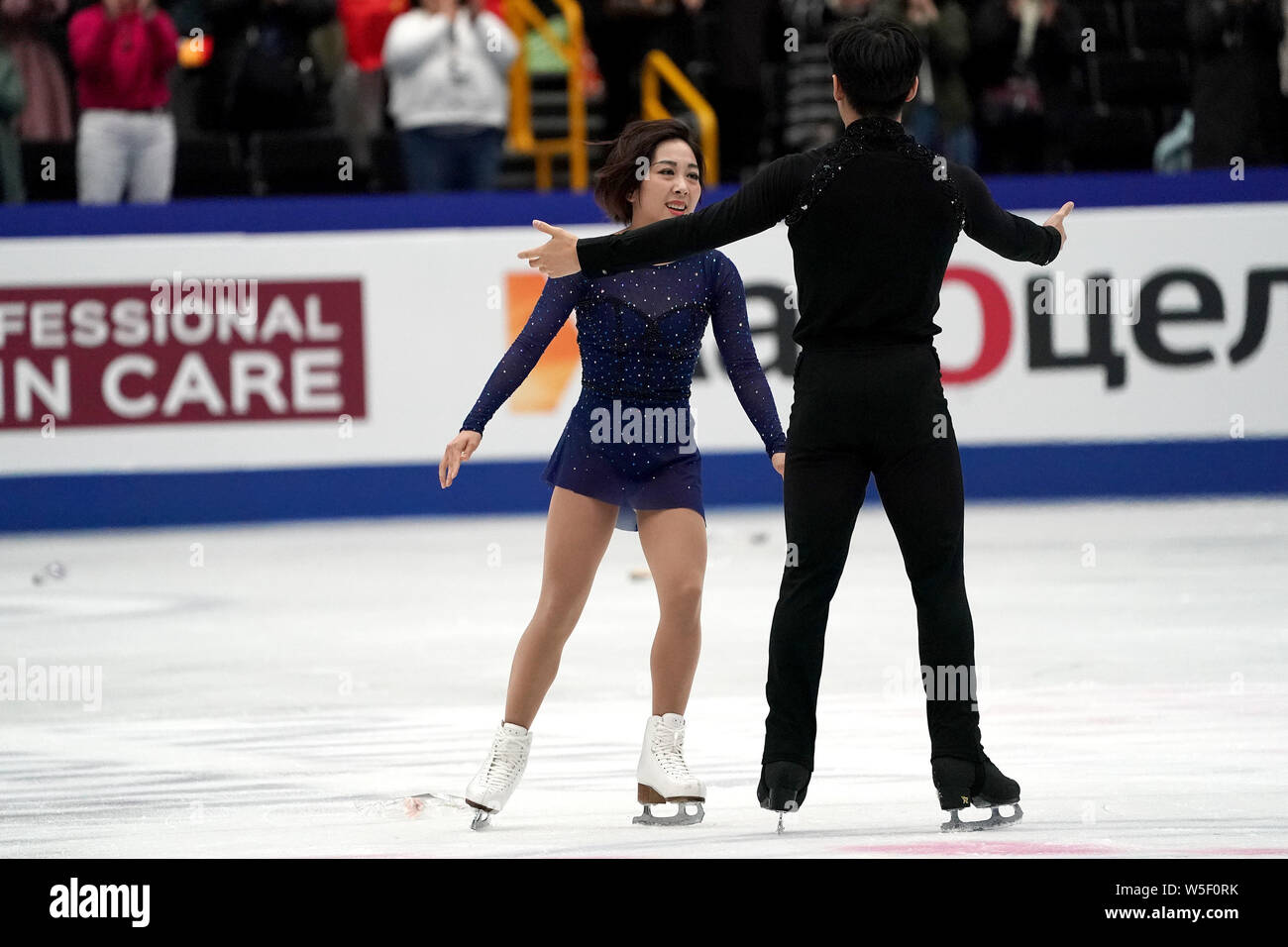 Chinese figure skaters Sui Wenjing and Han Cong compete in the Pairs ...