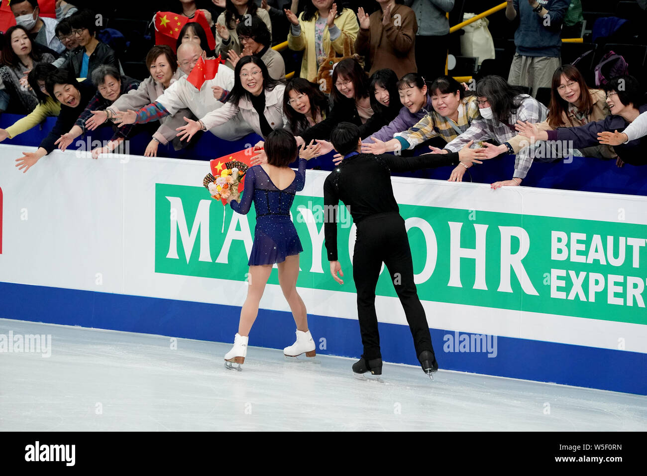 Chinese figure skaters Sui Wenjing and Han Cong compete in the Pairs ...