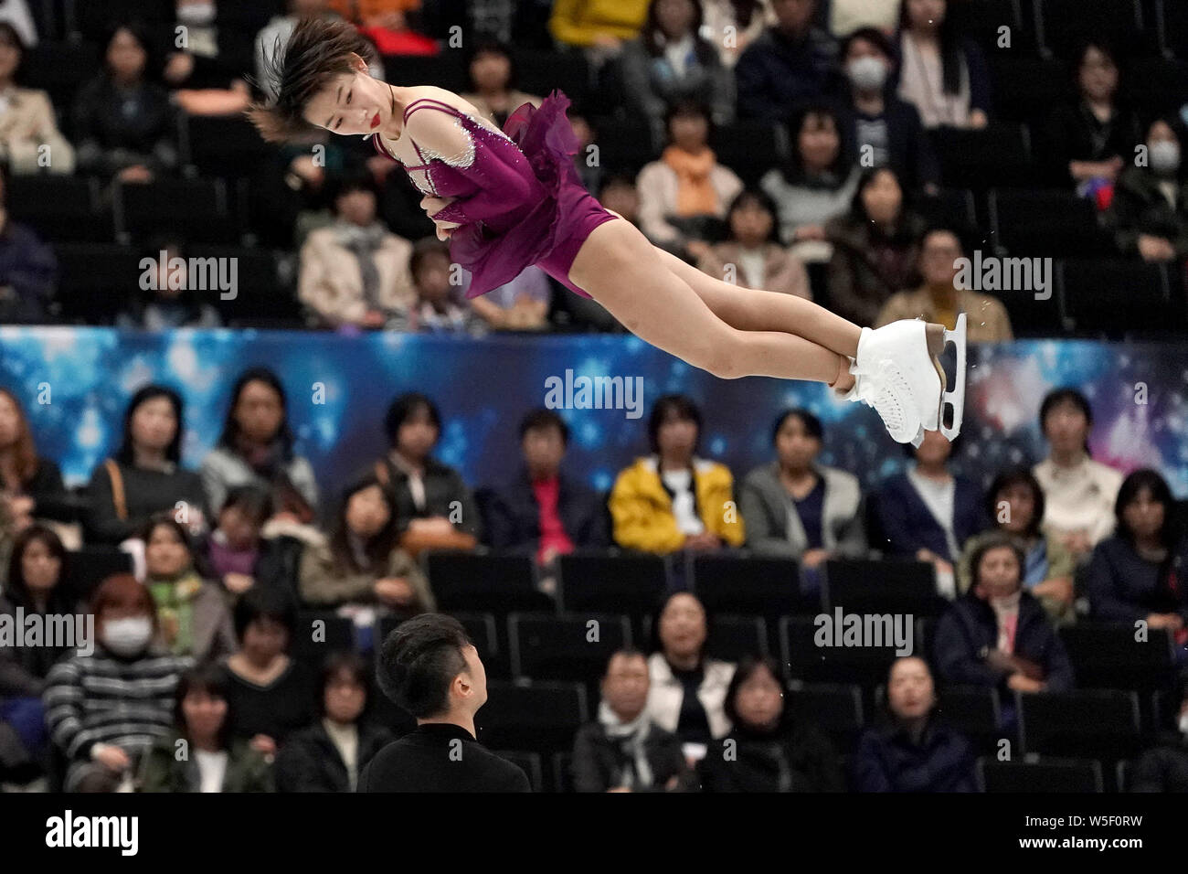 Chinese figure skater Peng Cheng competes in the Pairs Free Skating of ...