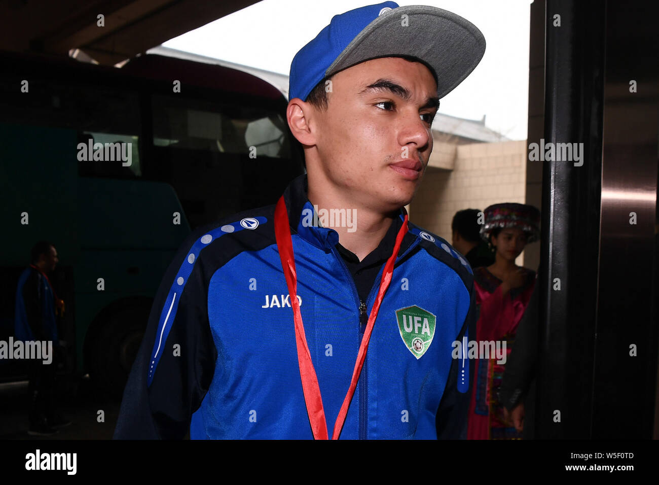 Players of Uzbekistan national men's football team arrive at a hotel ...