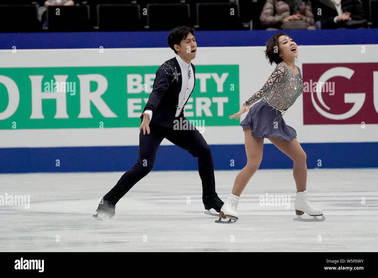 Chinese figure skaters Sui Wenjing and Han Cong compete in the Pairs ...