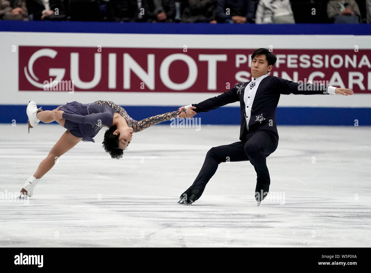 Chinese figure skaters Sui Wenjing and Han Cong compete in the Pairs ...