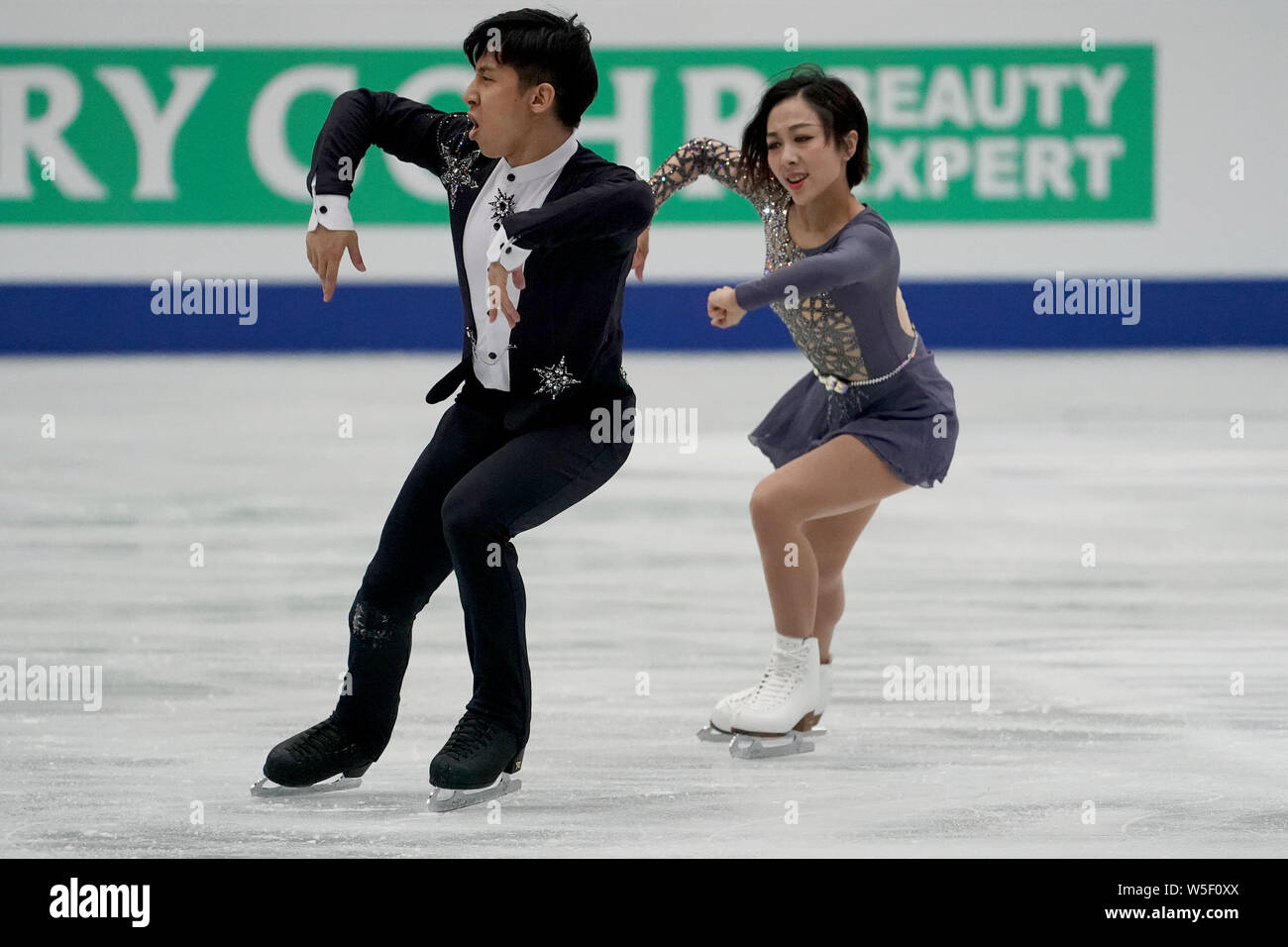 Chinese figure skaters Sui Wenjing and Han Cong compete in the Pairs ...