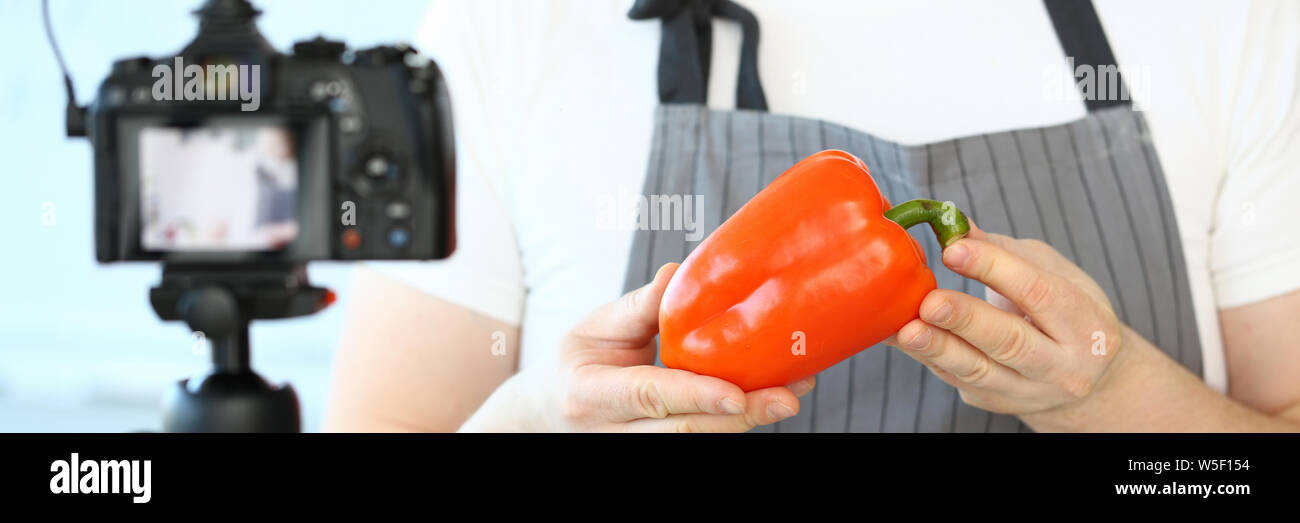 Chef Vlogger Showing Camcorder Orange Pepper Stock Photo - Alamy