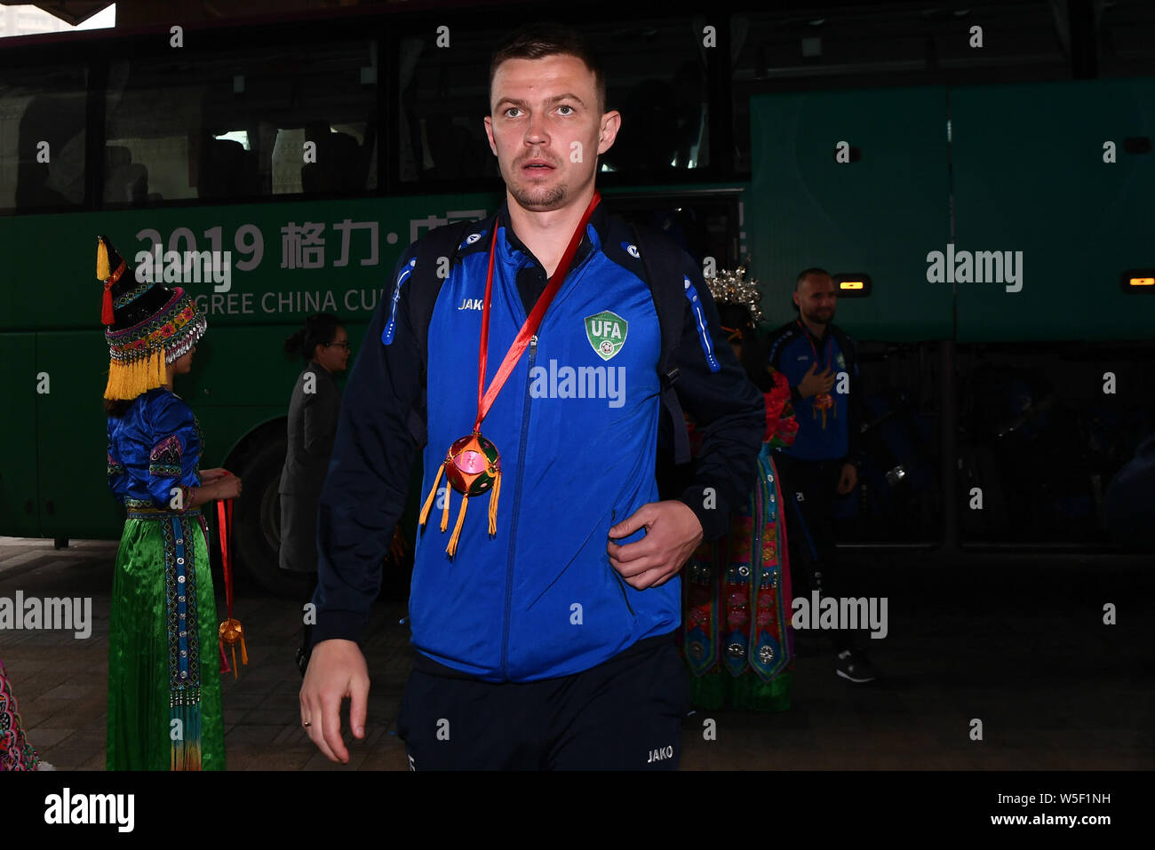 Players of Uzbekistan national men's football team arrive at a hotel ...