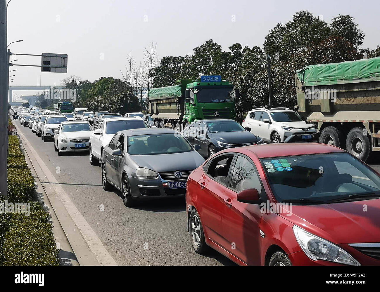 Vehicles are parked on a highway in Ningbo city, east China's Zhejiang ...