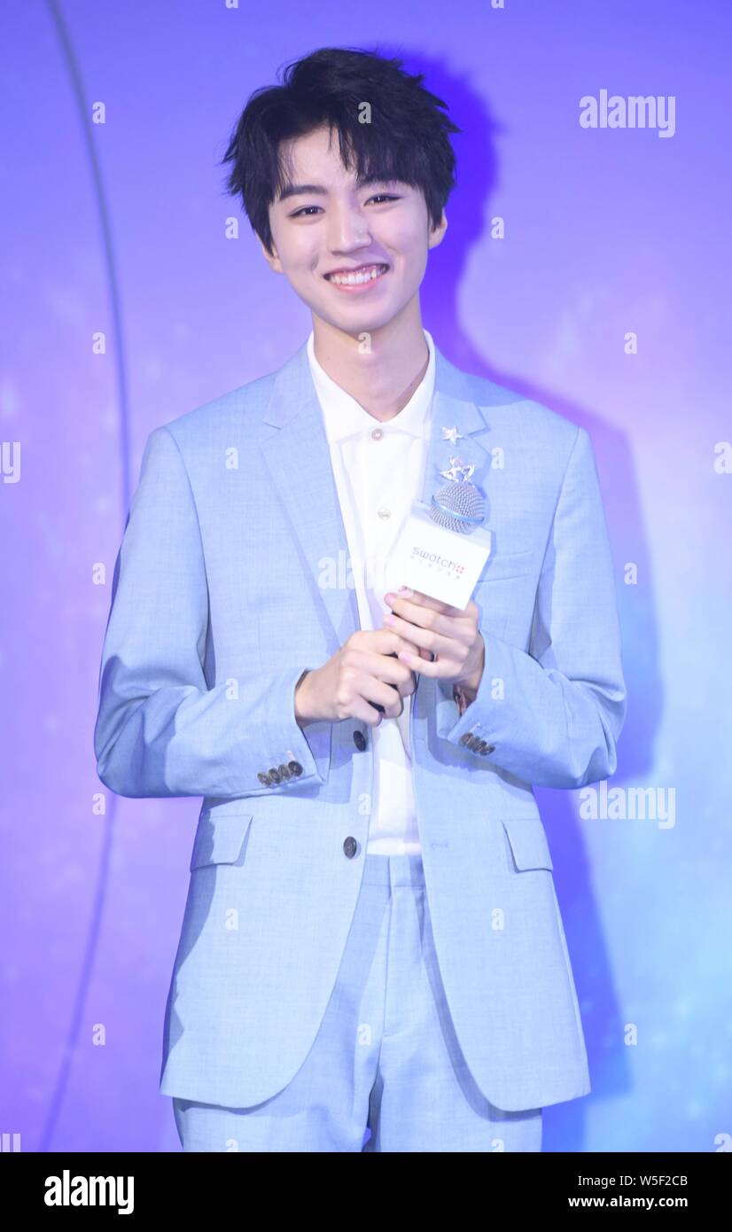 Karry Wang Jun Kai of Chinese boy group TFBoys attends a promotional ...