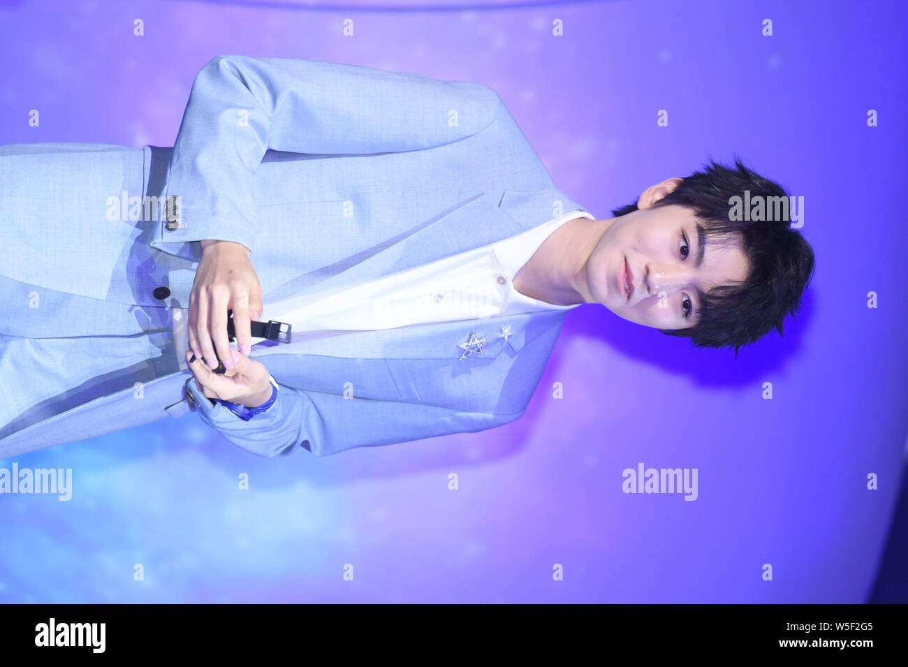 Karry Wang Jun Kai of Chinese boy group TFBoys attends a promotional ...