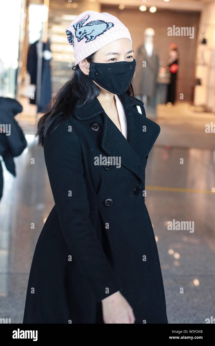 Taiwanese actress Michelle Chen wearing a face mask arrives at the ...