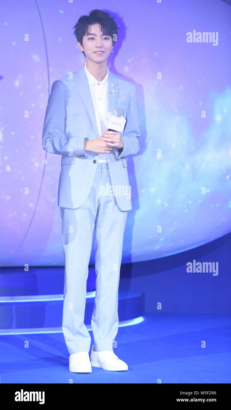 Karry Wang Jun Kai of Chinese boy group TFBoys attends a promotional event for Swatch in Beijing ...