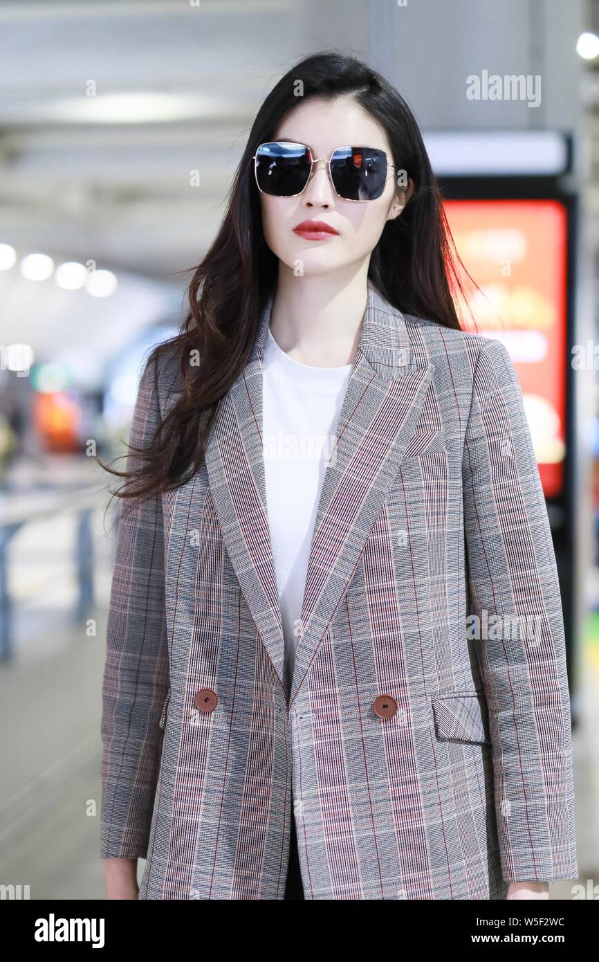 Chinese supermodel He Sui leaves the terminal after landing at the ...