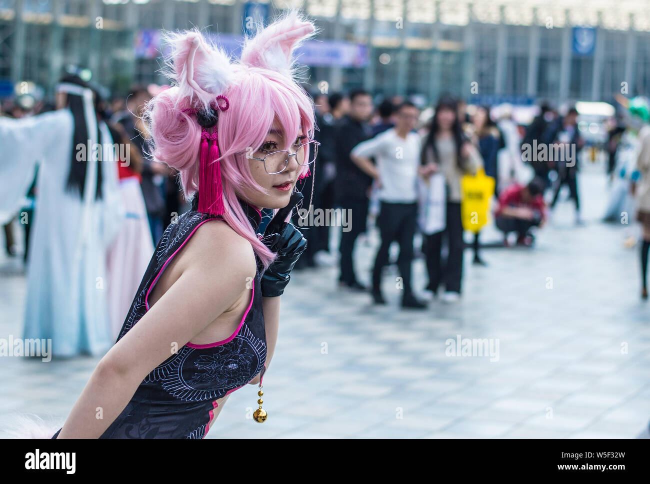 A Chinese coser dressed in cosplay costumes poses during the 23rd ...