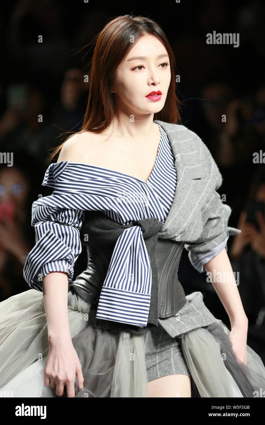 Chinese actress Qin Lan displays a new creation at the Solo Celeb ...