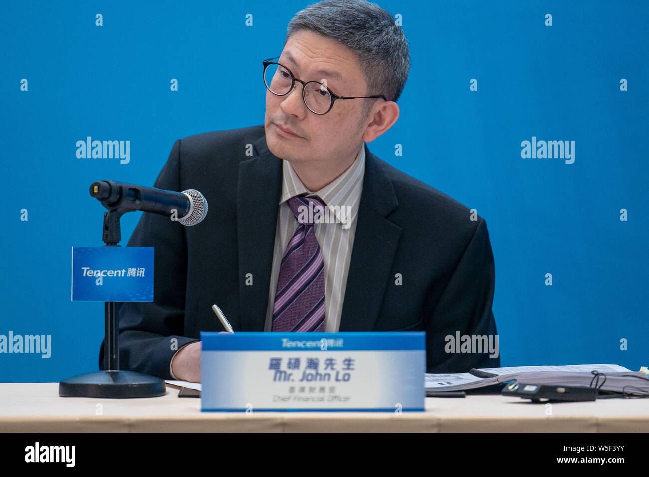 John Lo, CFO of Tencent, attends the Tencent 2018 Annual Results ...