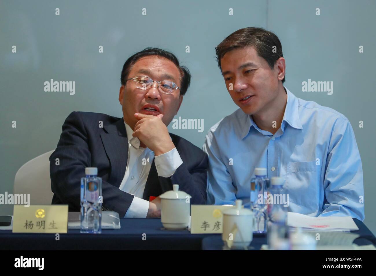 Robin Li Yanhong, right, Chairman and CEO of Baidu and member of the ...