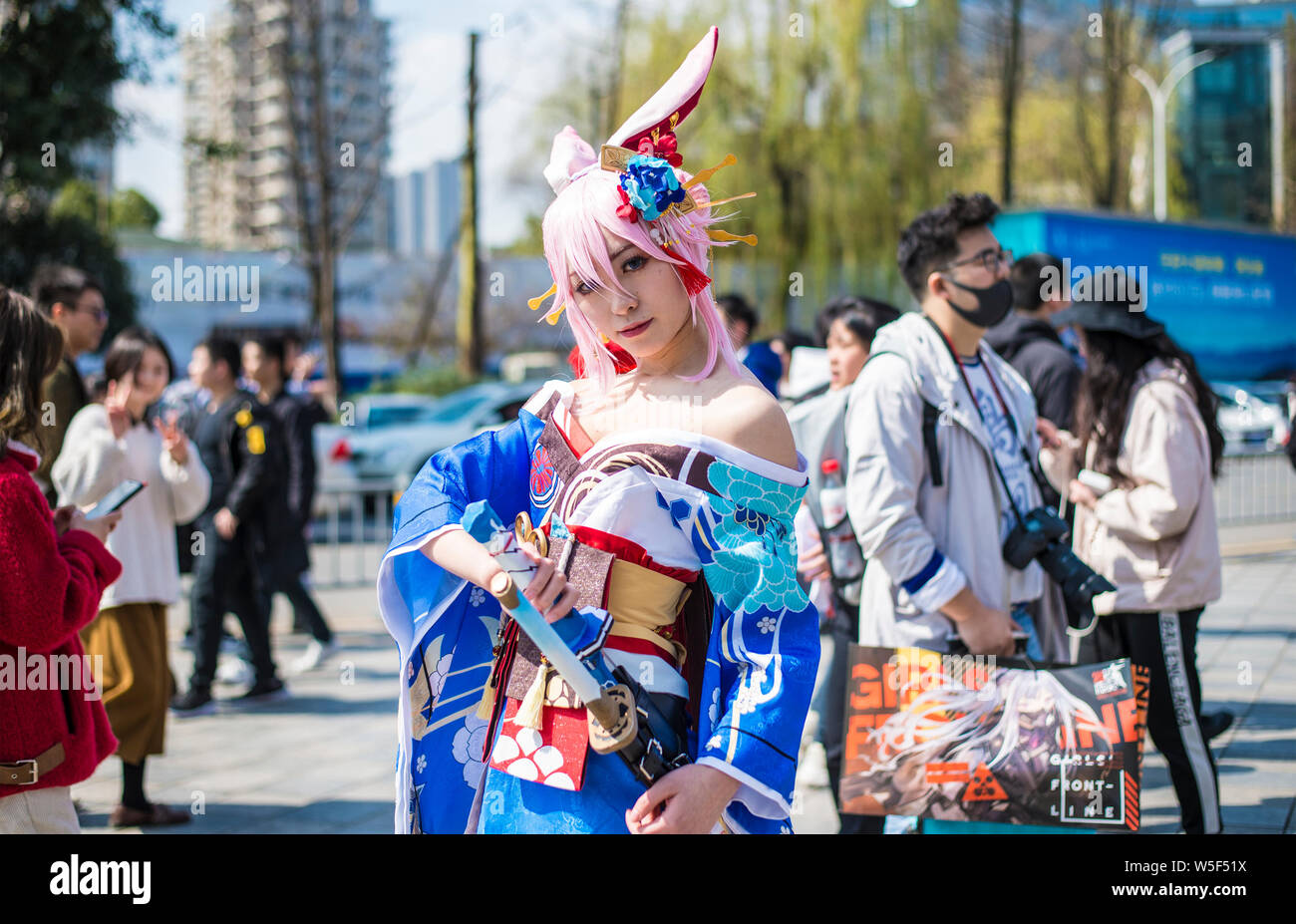 A Chinese coser dressed in cosplay costumes poses during the 23rd ...