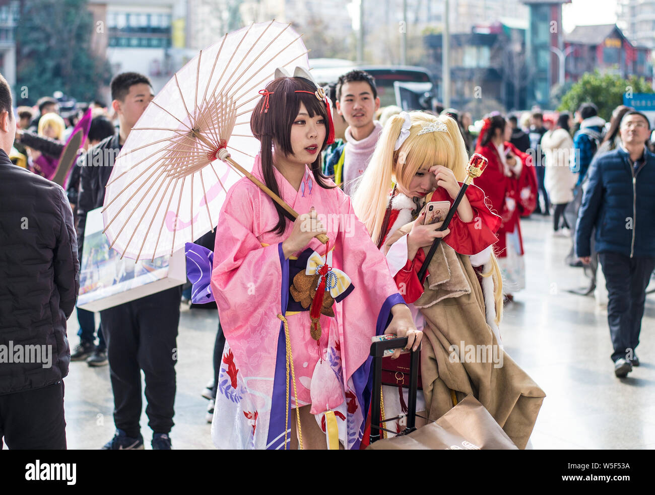 Chinese cosers dressed in cosplay costumes pose during the 23rd Chengdu ...