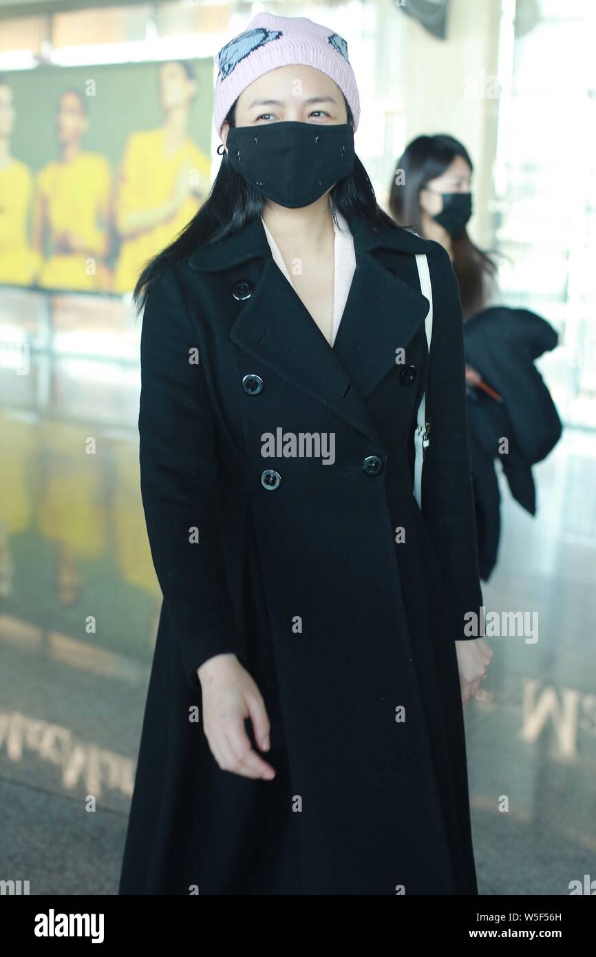 Taiwanese actress Michelle Chen wearing a face mask arrives at the ...