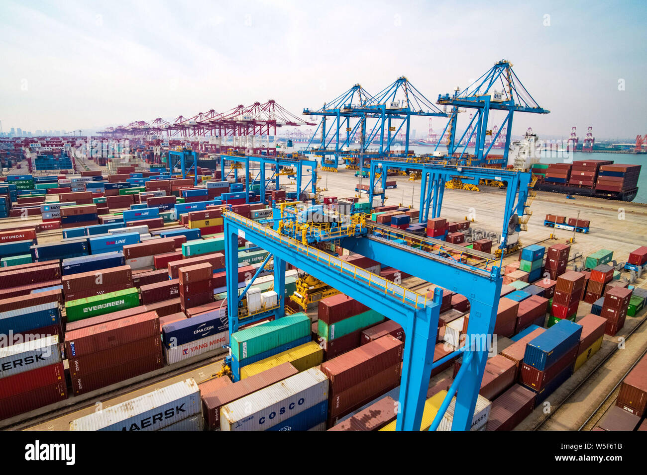 --FILE--An aerial view of containers stacked at the fully automated container terminal at the ...