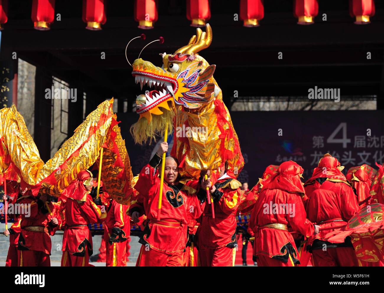 Chinese entertainers perform a dragon dance to celebrate the Dragon ...
